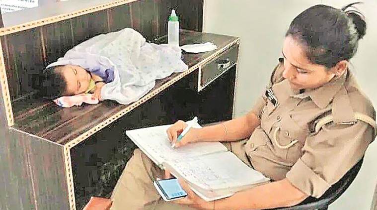 Woman constable at work with baby: Day after photo went viral, cop ...