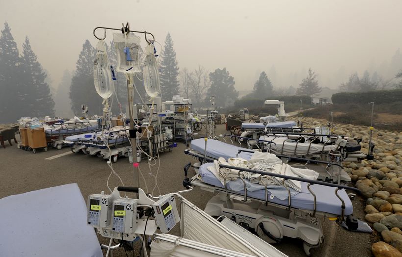 PHOTOS: California wildfire refugees camp in Walmart parking lot amid ...