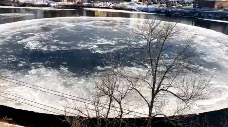 Gigantic spinning ice disc spotted in the middle of river Maine ...