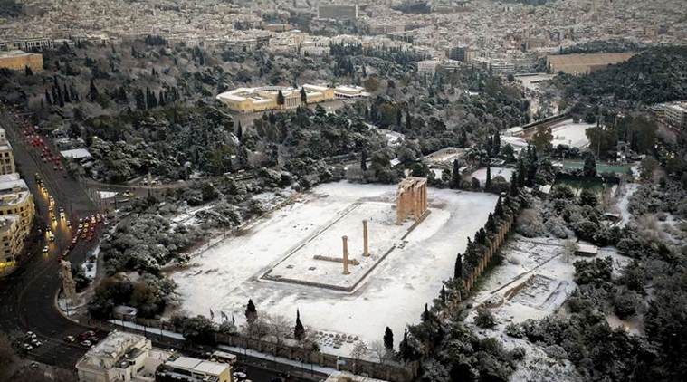 Snow coats ancient monuments in Athens amid record cold spell | World ...