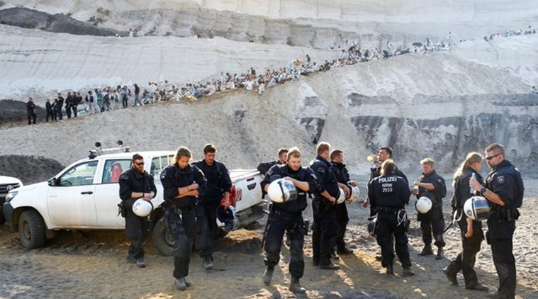Climate protesters storm open-pit mine in western Germany | World News ...