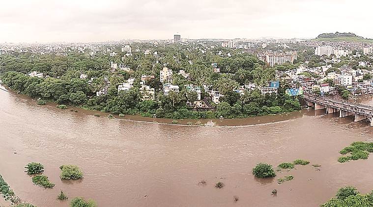 Pune: Water released in Mutha river submerges Bhide bridge, throws ...