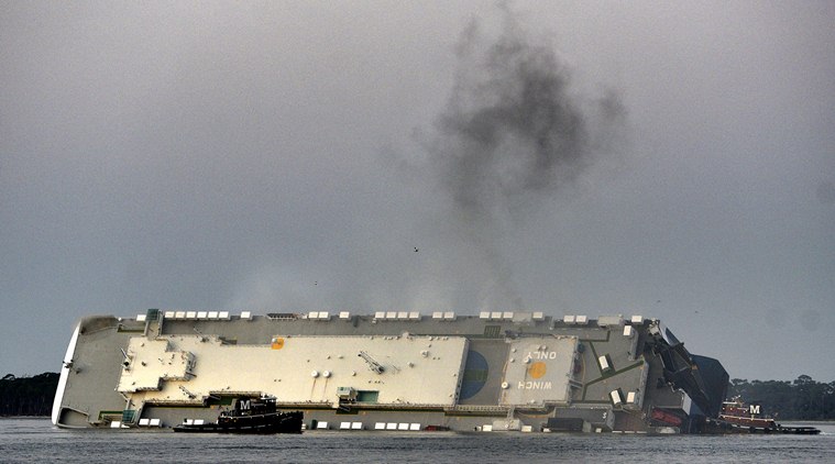Georgia: Search on for four missing after cargo ship overturned | World ...