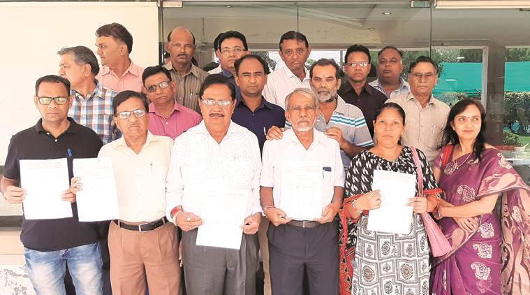 SC/ST employees complain of discrimination, I-T dept denies | Ahmedabad ...