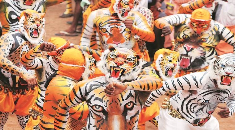 During Onam, the annual Pulikali festival in Thrissur sees people get ...