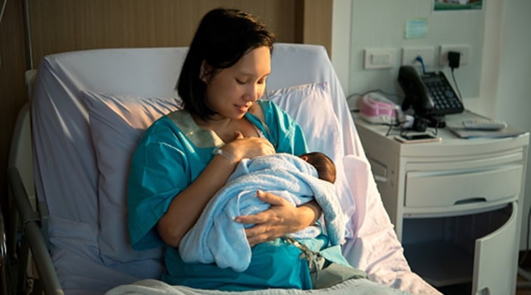 Football hold and other breastfeeding positions to help your baby latch ...