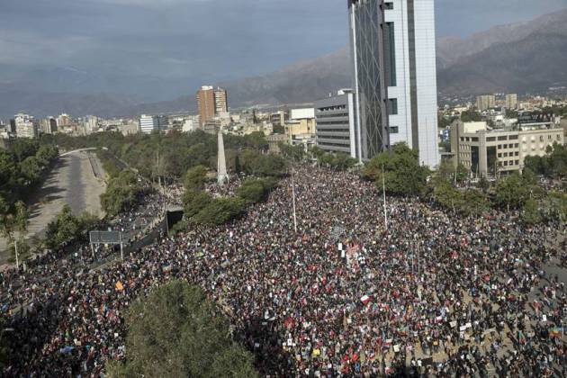 Thousands march in Chile protest after two key summit cancellations ...