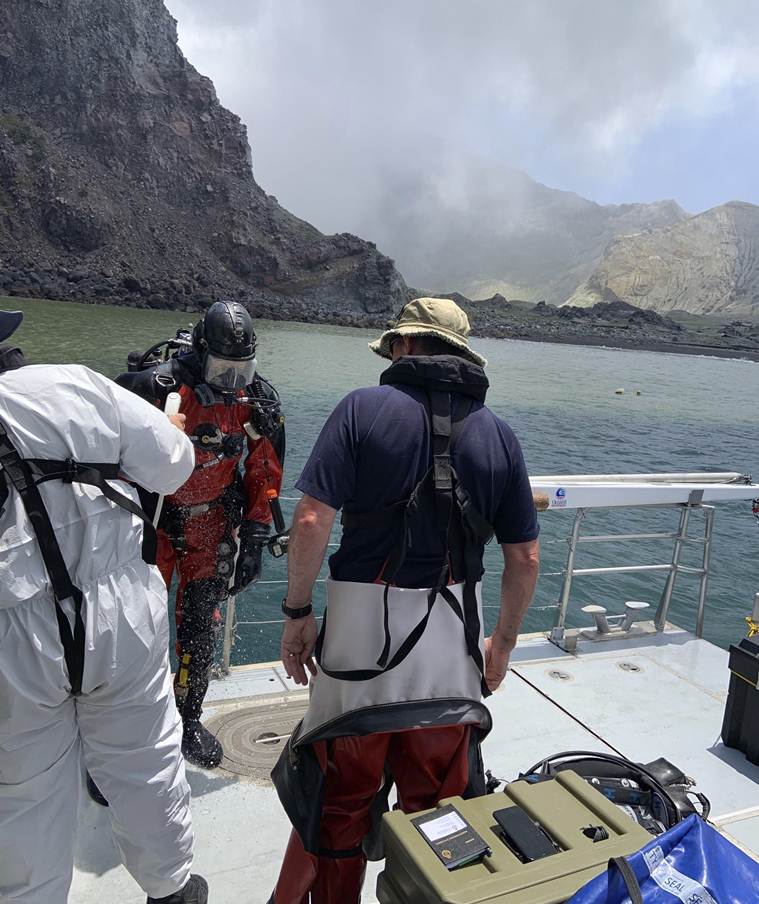 New Zealand divers attempt to recover last 2 volcano victims | World ...