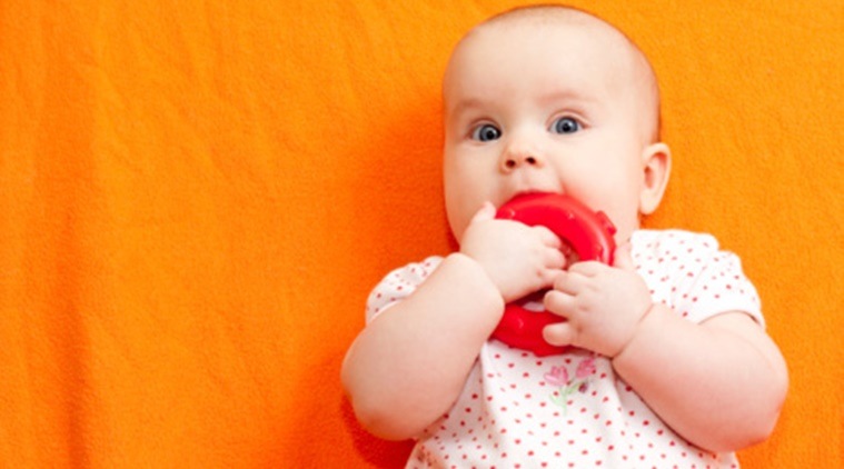 Why do babies bite and do you need to stop them? | Parenting News - The ...