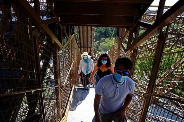 Eiffel Tower reopens after longest closure since World War II | World ... Eiffel Tower reopens after longest closure since World War II | World ...