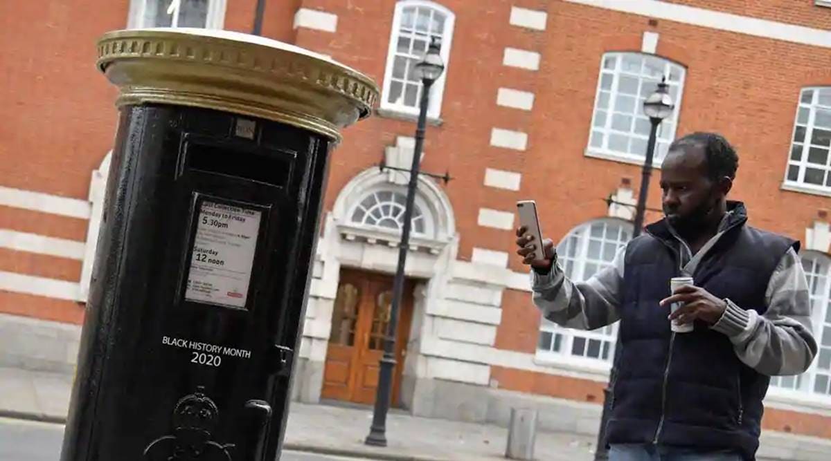 Paint it black: UK postboxes change colour to honour Black Britons ...