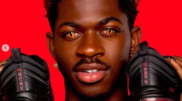 Nike sues art collective over controversial pair of shoes containing ...