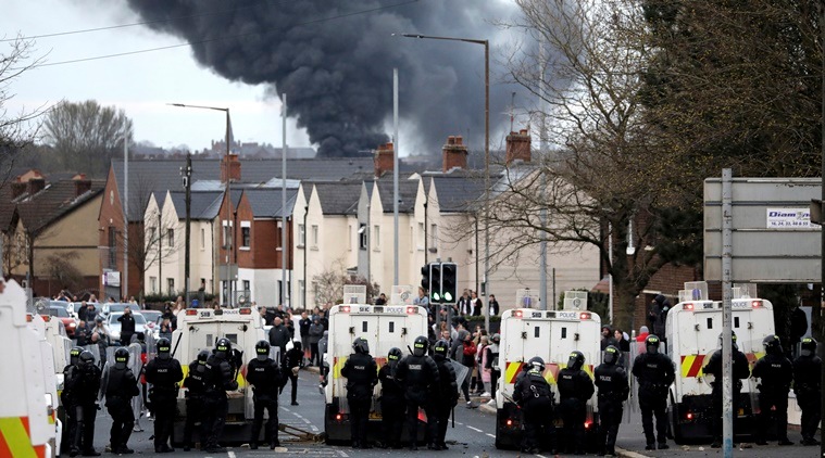 UK PM Boris Johnson urges calm as Belfast protesters hijack bus, attack ...