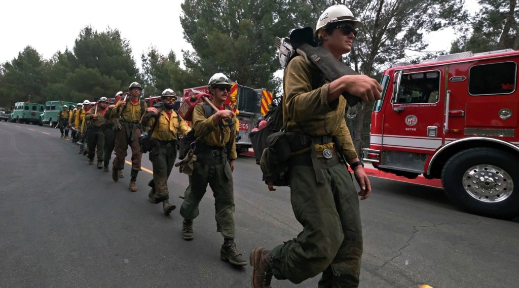 Arson suspect arrested in wildfire burning in hills of western Los ...