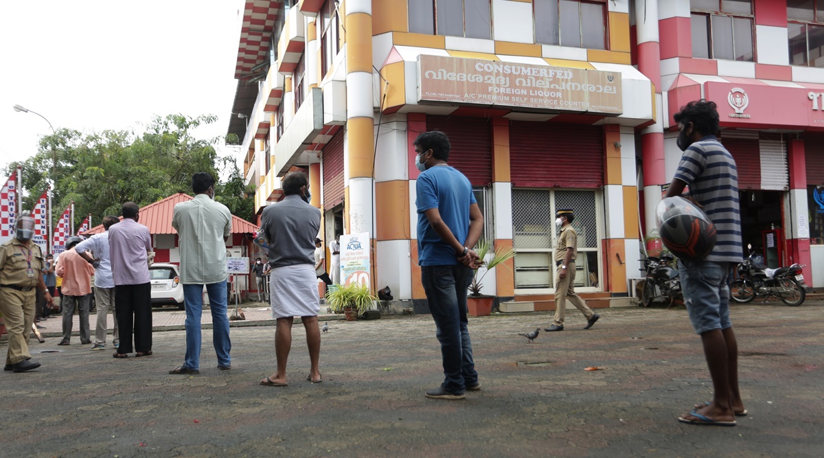Long queues outside Kerala liquor shops after easing of Covid restrictions