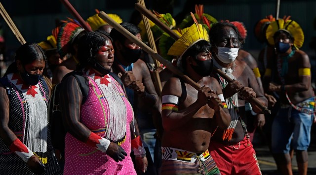 Firing arrows, indigenous people in Brazil protest bill curtailing land ...
