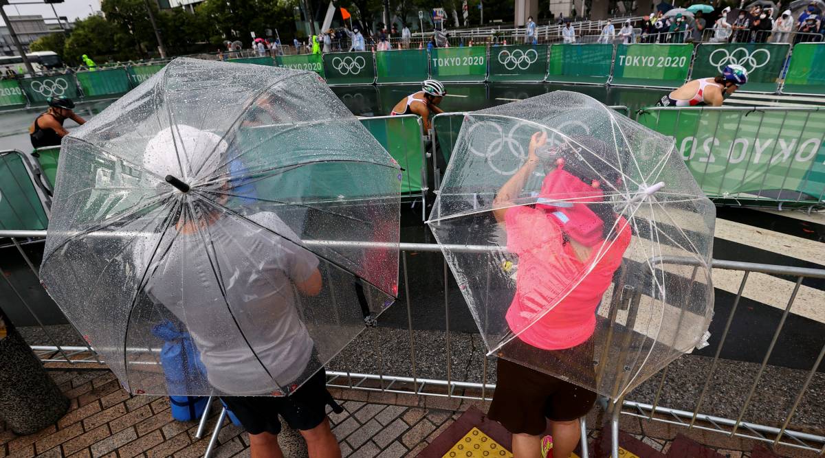 Sneaking a peek: Fans find creative ways to glimpse Olympics | Olympics ...