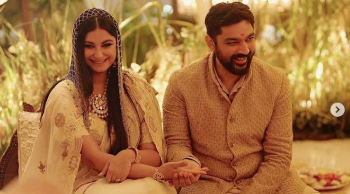 Karan Boolani’s bandhgala was customised with the couple’s names ...