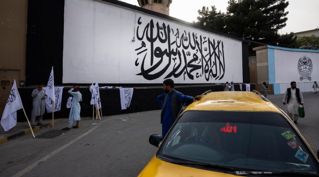 As world marks 9/11, Taliban flag raised over seat of power | World ...