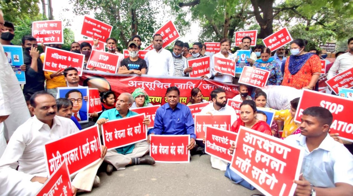 Members of SC, ST communities stage protest against National ...