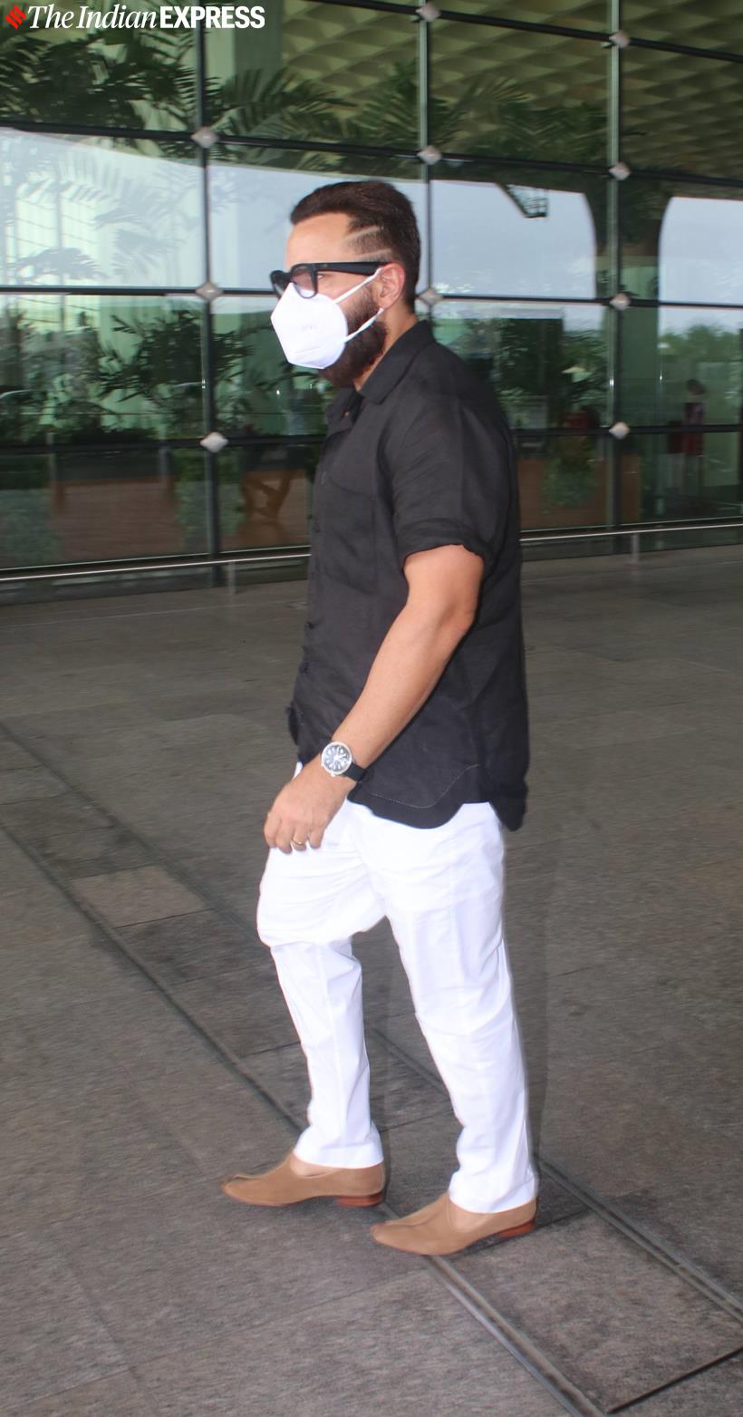 Kareena Kapoor holds son Jeh while Taimur is busy posing with dad Saif ...