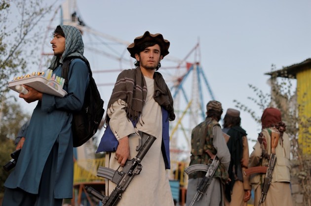 Taliban fighters take over amusement park in Kabul | World News News ...