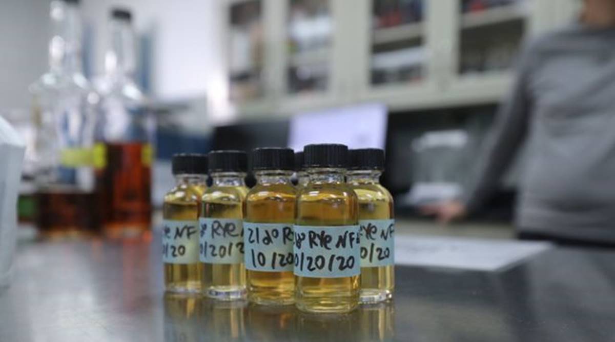 With lab help, whiskey distillers skip oak barrel-aging. But how does ...