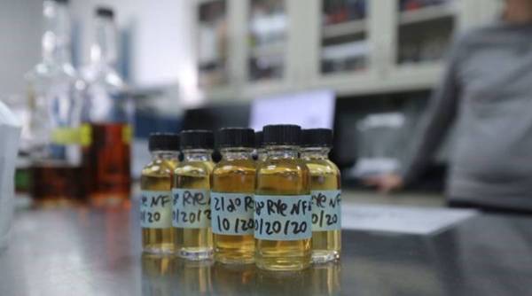 With lab help, whiskey distillers skip oak barrel-aging. But how does ...