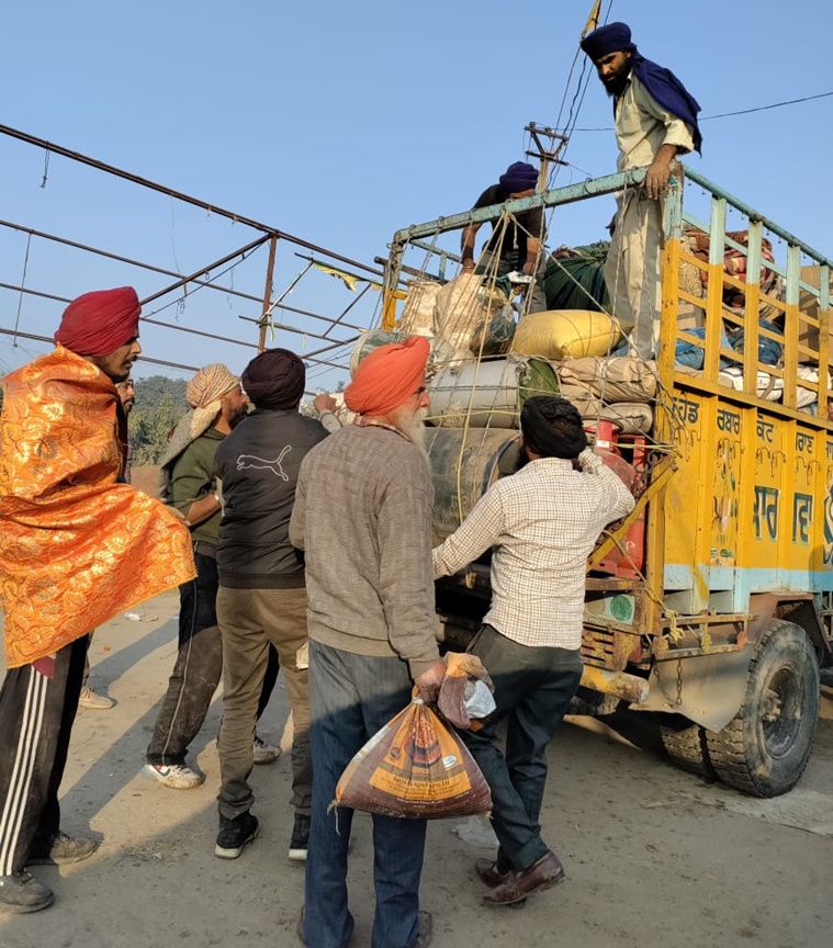 Singhu border: After 15-month-long stir, farmers start journey back ...