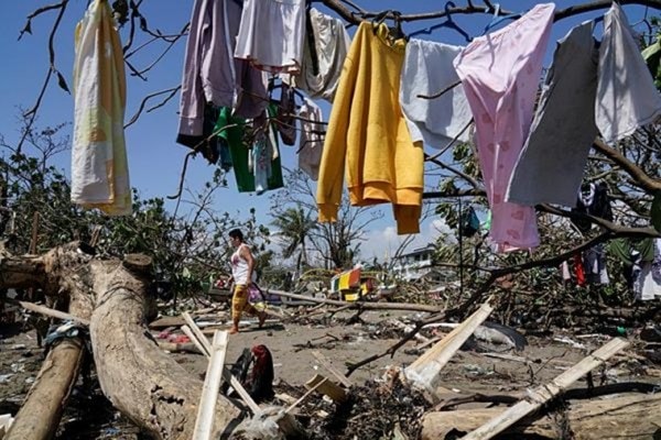 ‘Help Us’: After Typhoon Rai, miles of destruction and the smell of ...