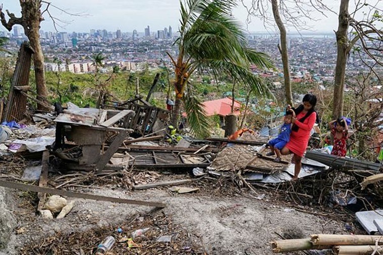 ‘Help Us’: After Typhoon Rai, miles of destruction and the smell of ...