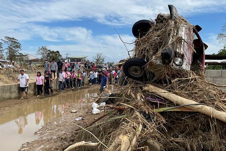 ‘Help Us’: After Typhoon Rai, miles of destruction and the smell of ...