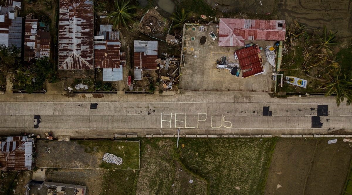 ‘Help Us’: After Typhoon Rai, miles of destruction and the smell of ...