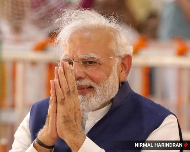 PM Modi spins charkha at Khadi Utsav in Ahmedabad, kicks off his ...