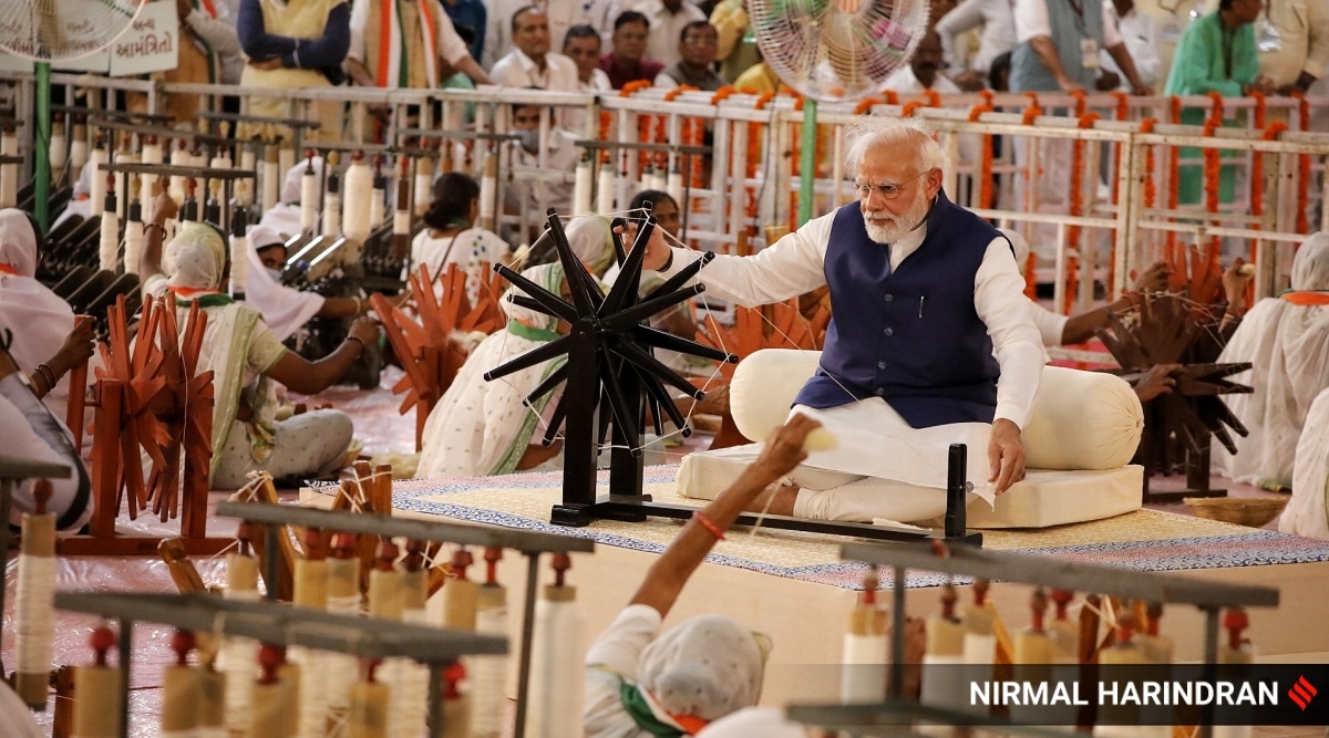 PM Modi spins charkha at Khadi Utsav in Ahmedabad, kicks off his Gujarat visit | India News News ...