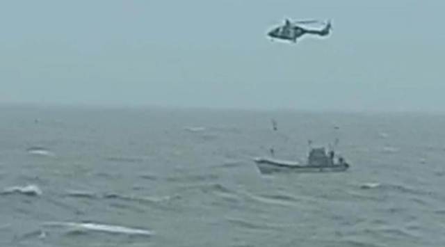 Coast Guard airlifts 10 fishermen from turbulent sea to safety in ...