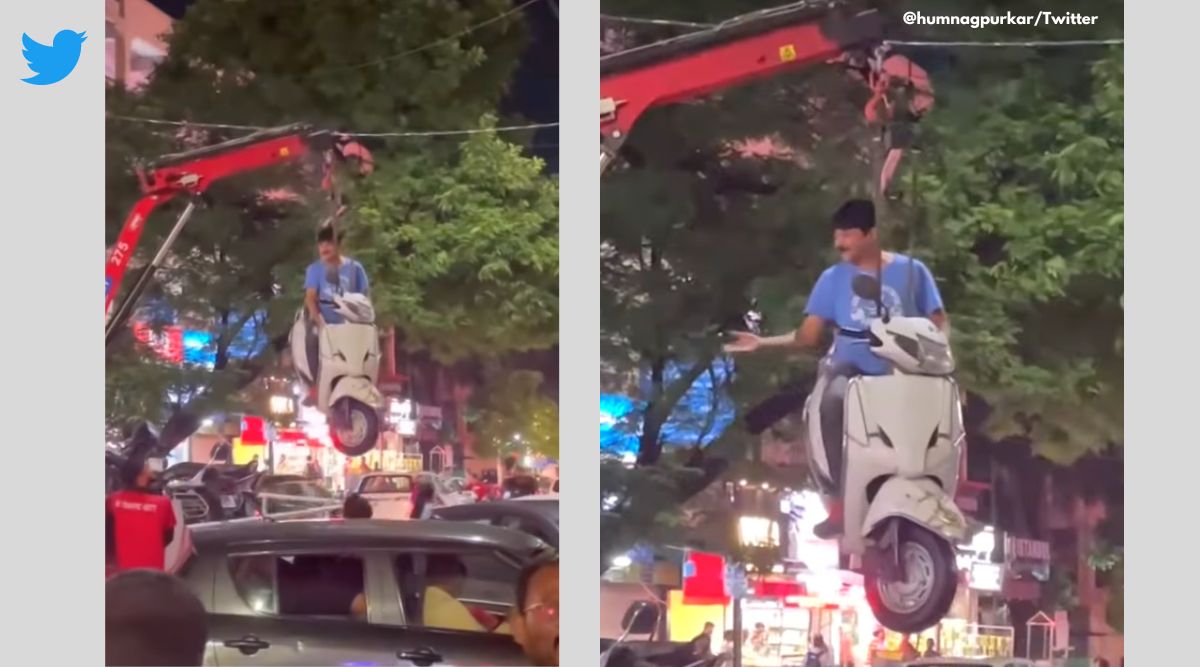 Watch: Man sits on scooter as it hangs in air while getting towed ...