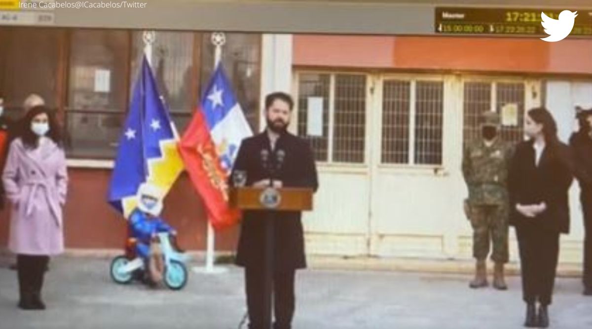 Kid clad in Superman costume cycles around Chilean President, video ...