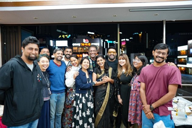 Kapil Sharma, wife Ginni Chatrath joins Zwigato team at Busan ...