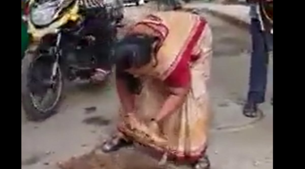 After narrowly ‘escaping death’, Bangalore couple fill potholes, video ...