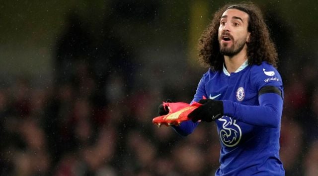 One silver and one orange: Chelsea defender Marc Cucurella plays with ...