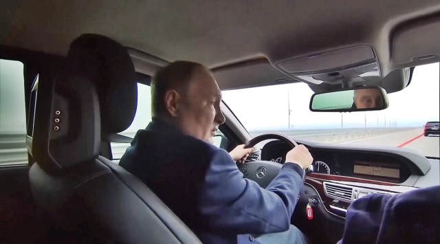 Watch: Putin drives across Crimea Bridge hit by blast, says ‘it needs ...