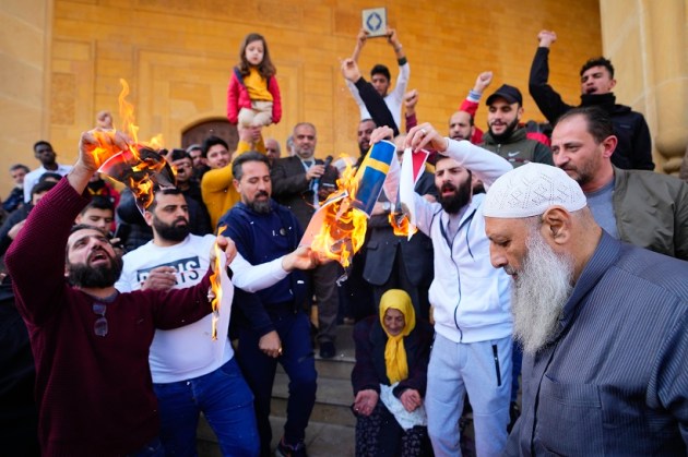 Muslim nations protest after far-right activists burn Quran in Sweden ...