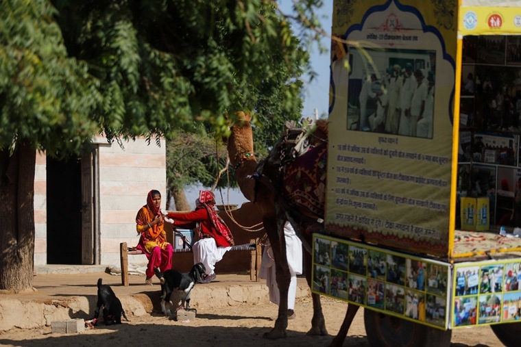 Camel carts, puppets, vaccine songs: Taking the Covid shot to the ...