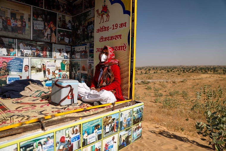 Camel carts, puppets, vaccine songs: Taking the Covid shot to the ...