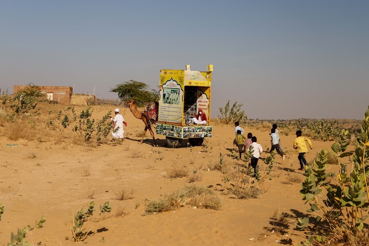 Camel carts, puppets, vaccine songs: Taking the Covid shot to the ...