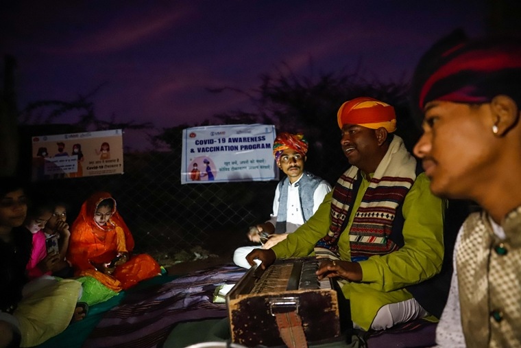 Camel carts, puppets, vaccine songs: Taking the Covid shot to the ...