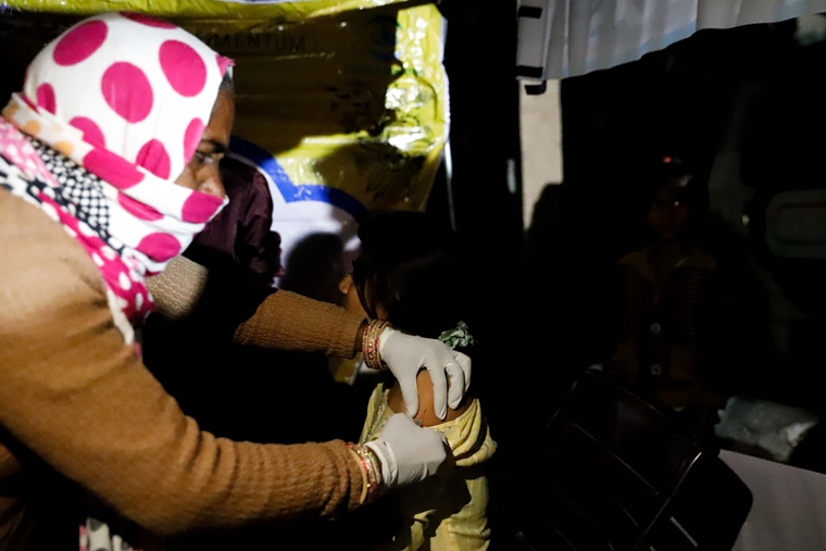 Camel carts, puppets, vaccine songs: Taking the Covid shot to the ...