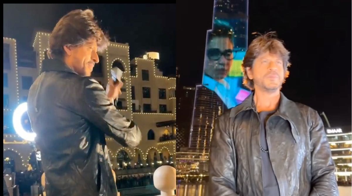 Shah Rukh Khan looks on as Pathaan trailer plays on Burj Khalifa, does signature pose and ...
