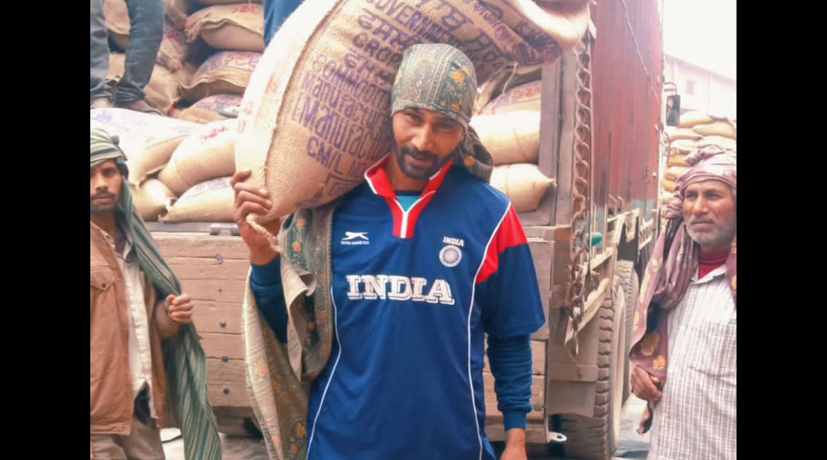 Express Impact: Punjab CM Mann gives hockey player Paramjeet Kumar, who works as porter ...
